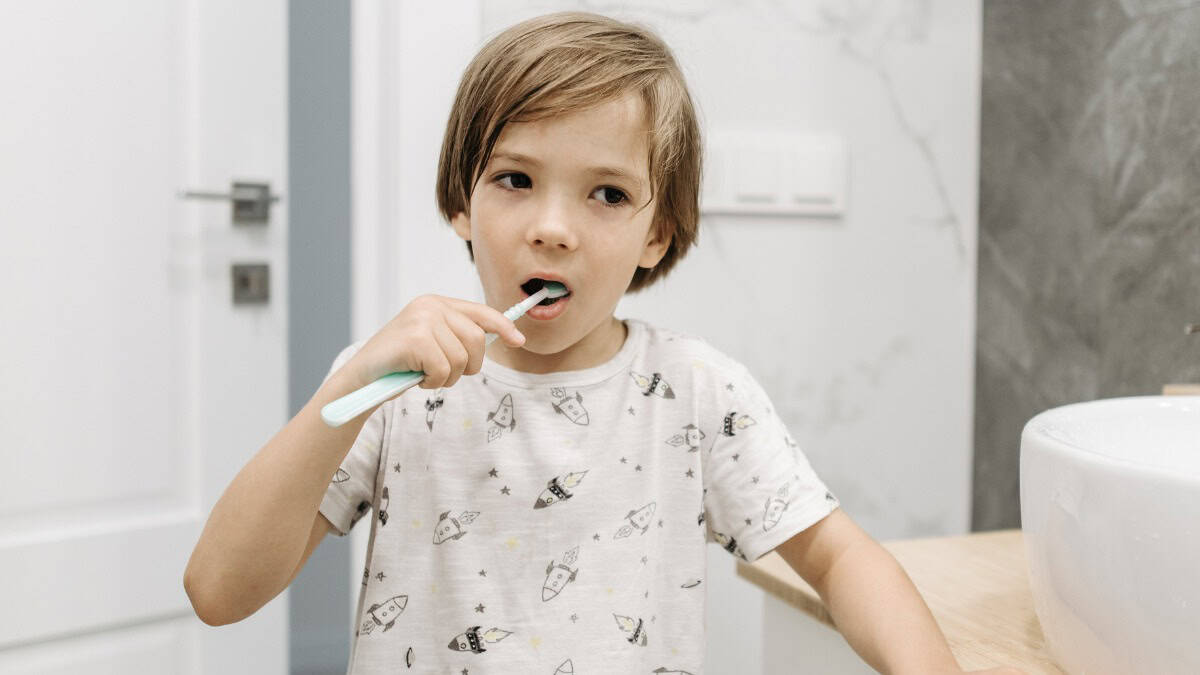 How to Help an Autistic Child with Brushing Teeth - JADE ABA
